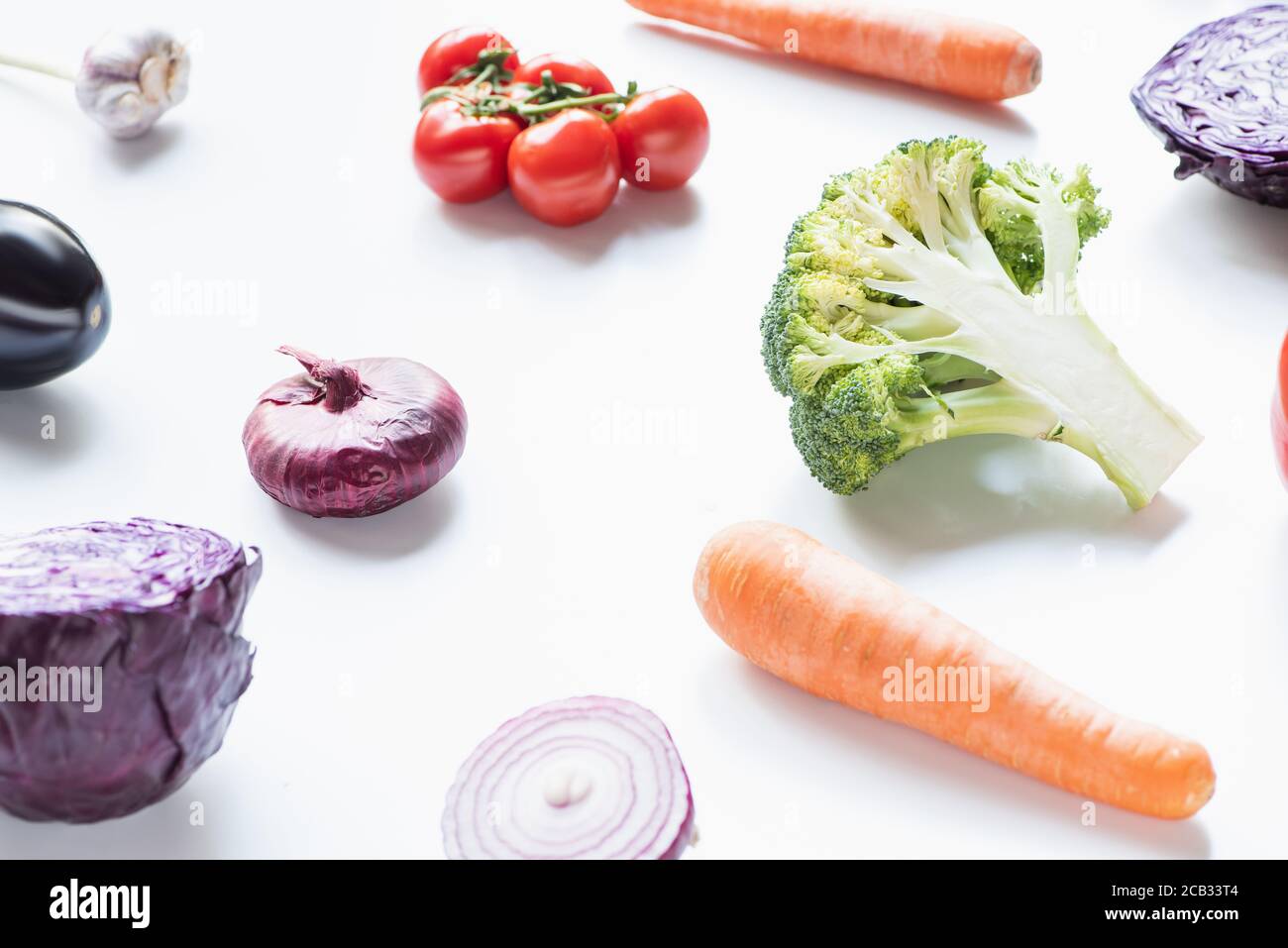 fresh ripe colorful vegetables scattered on white background Stock ...