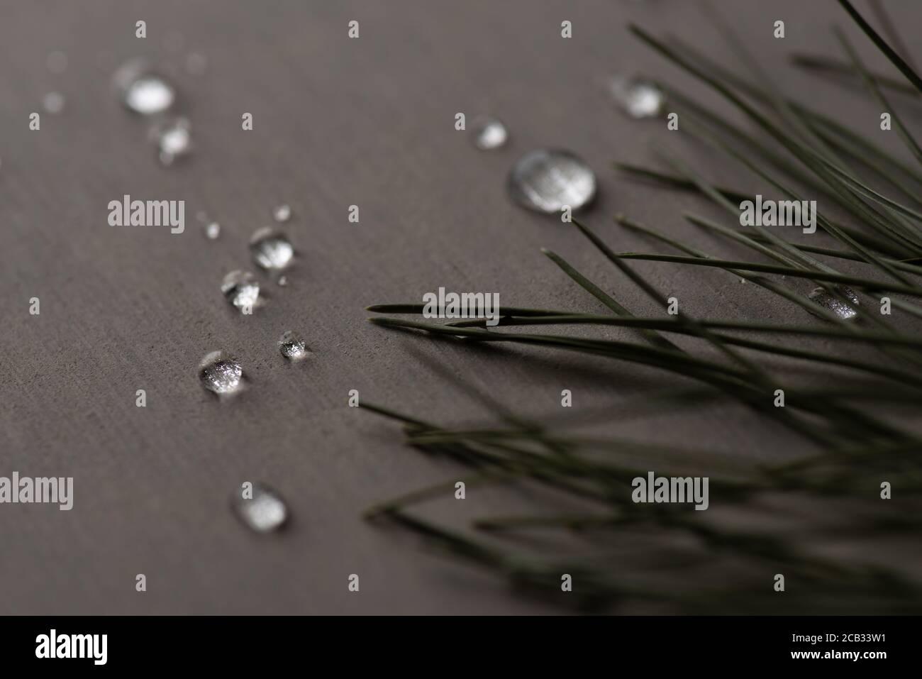 Water droplets on flat grey surface Stock Photo - Alamy