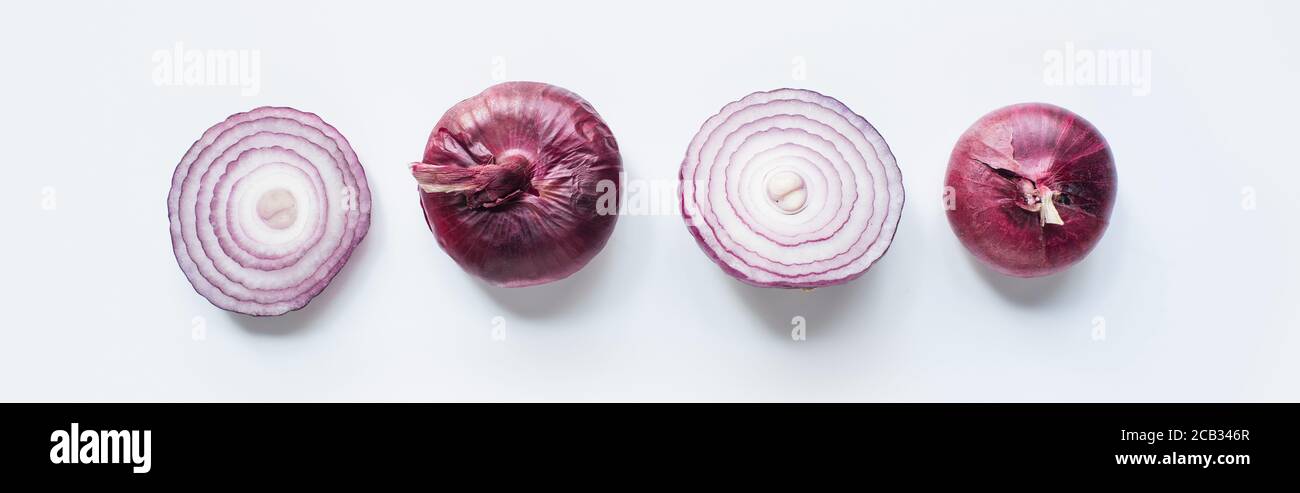 top view of cut and whole red onion on white background, panoramic shot ...
