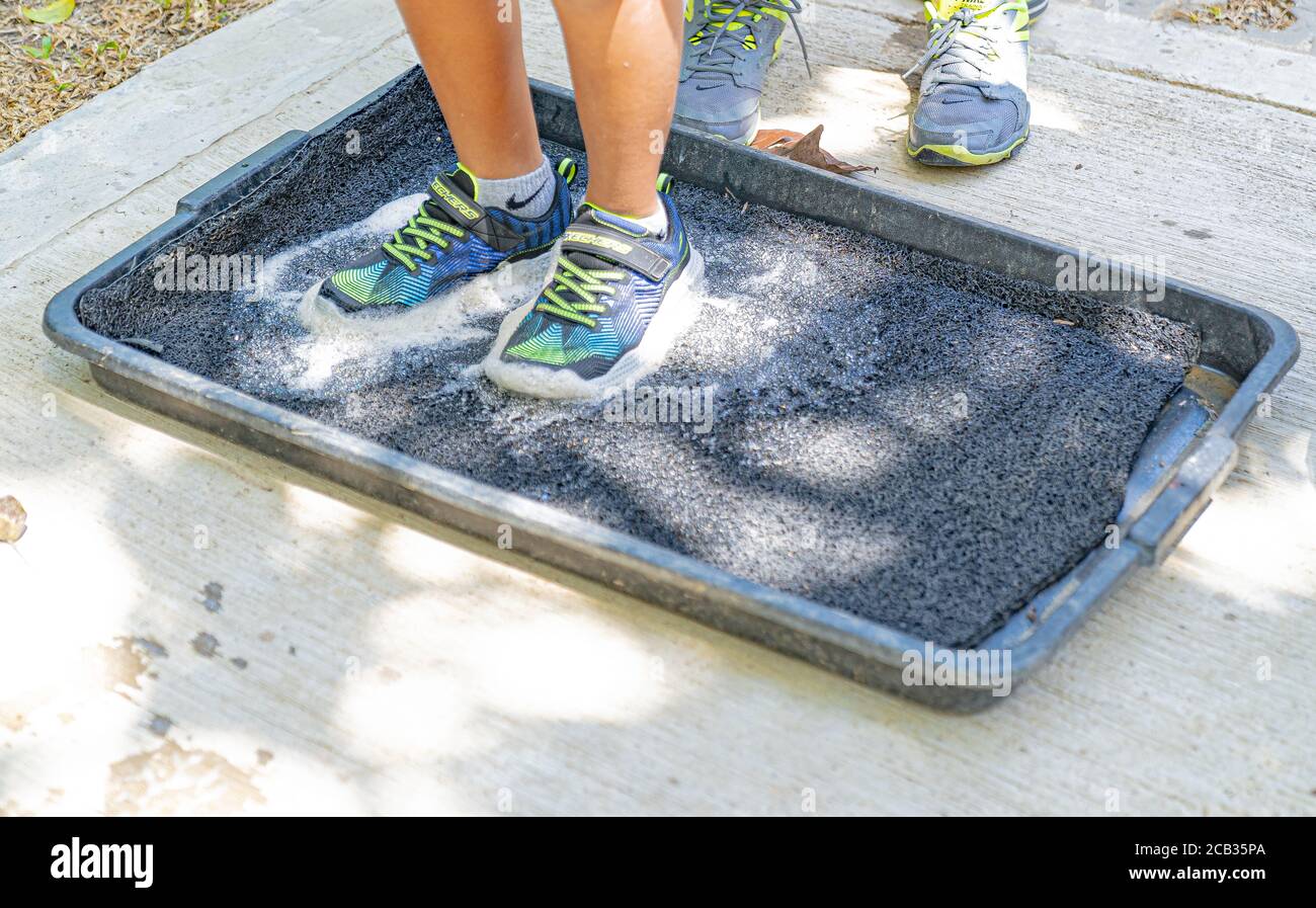 Disinfection of shoes before entering an area that should be sanitised ...