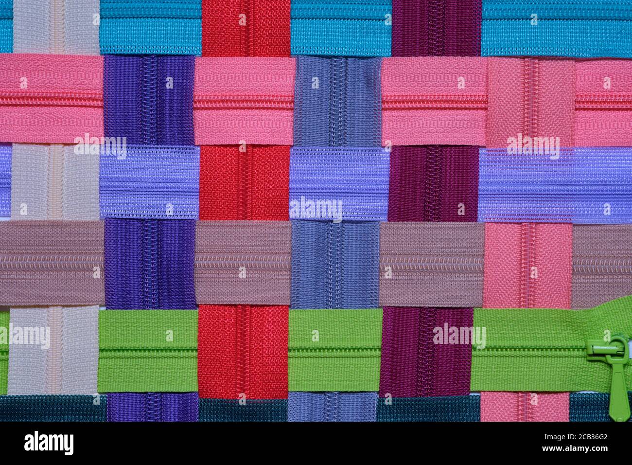 Colorful zipper for sewing and arrange as a background Stock Photo - Alamy