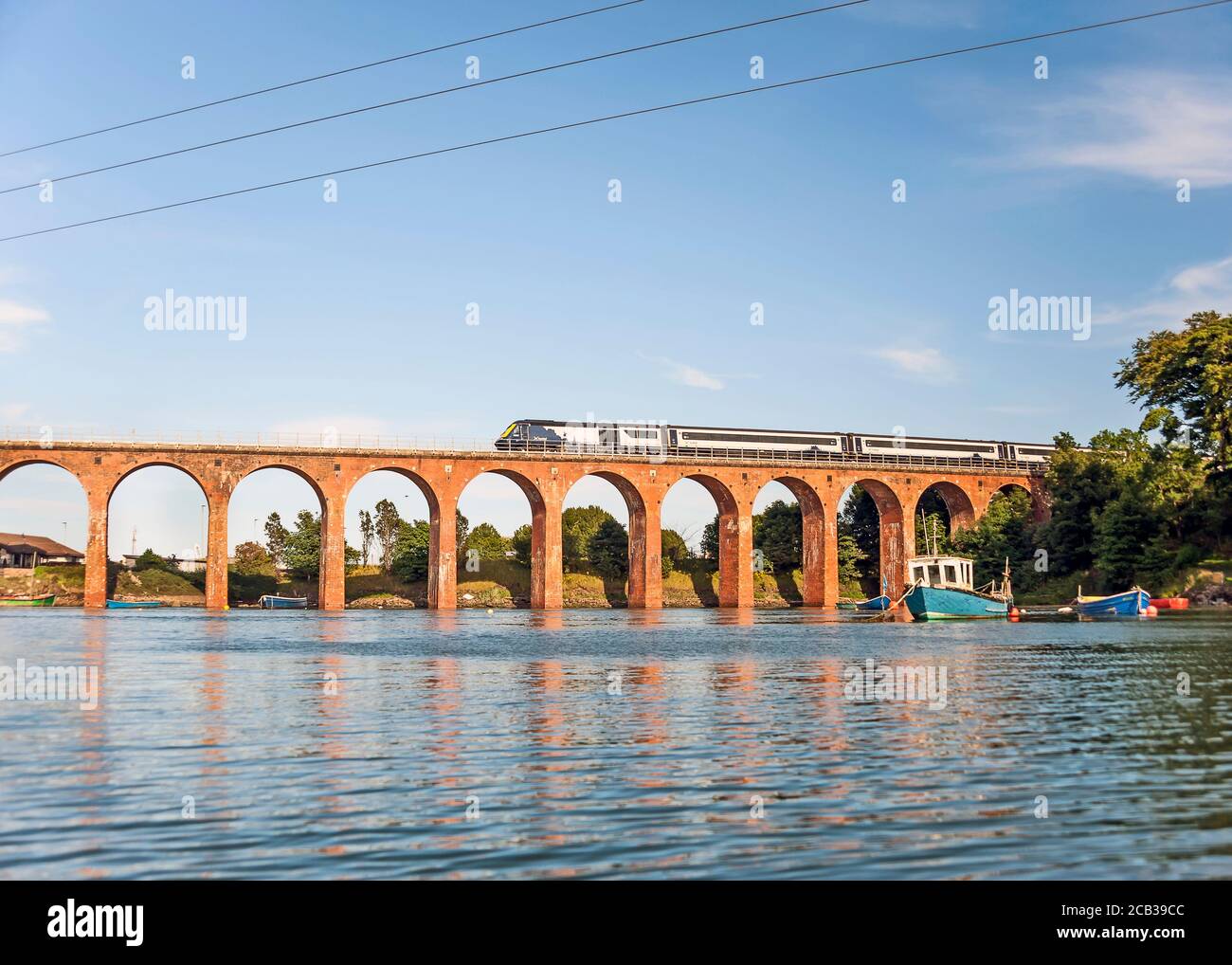 Landscape image from Montrose basin of the old red brick railway bridge ...