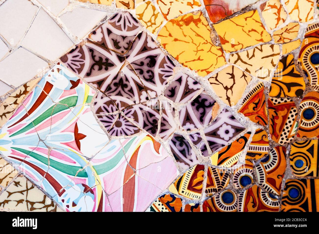 Antonio Gaudi's mosaic tile bench at Park Guell in Barcelona, Spain ...