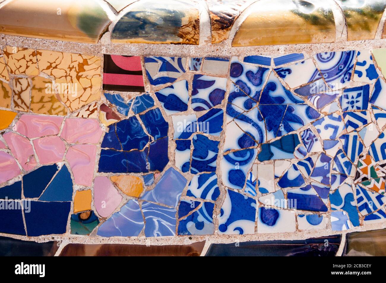 Antonio Gaudi's mosaic tile bench at Park Guell in Barcelona, Spain ...