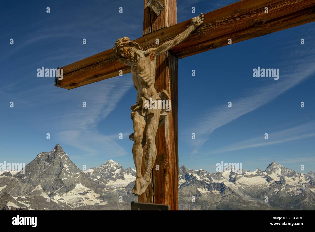 Crucifix on mount small Matterhorn over Zermatt on the Swiss alps Stock ...