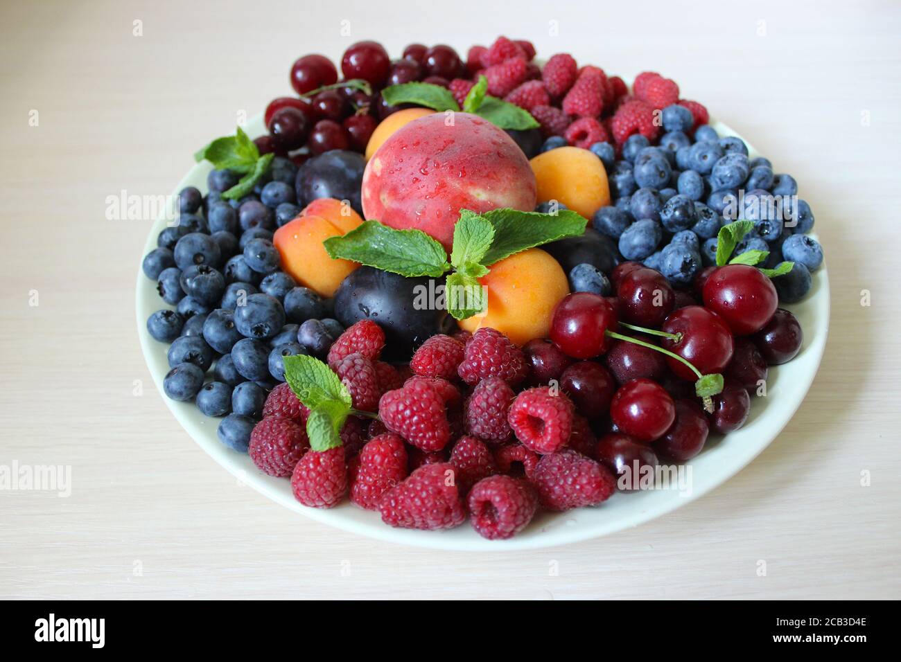 Different types of fresh fruit on a white background.Texture or ...