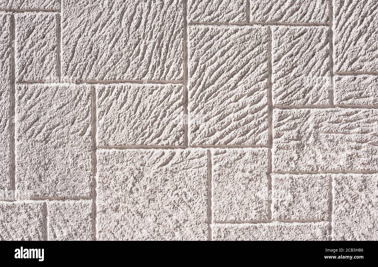 Wall background texture. Decorative random rocks panel, blocks with ...