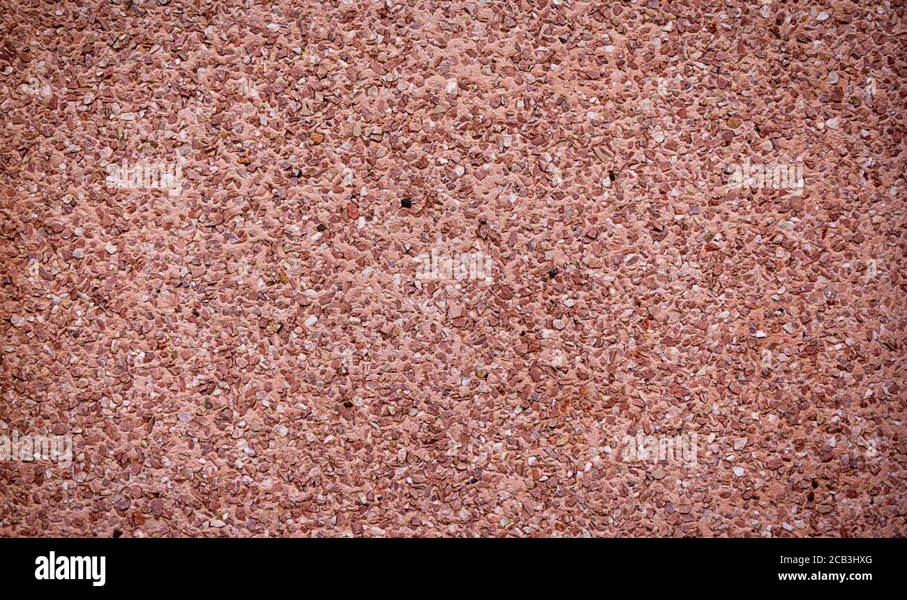 Wall background. Decorative marble chip plaster wall, outside. Mosaic ...