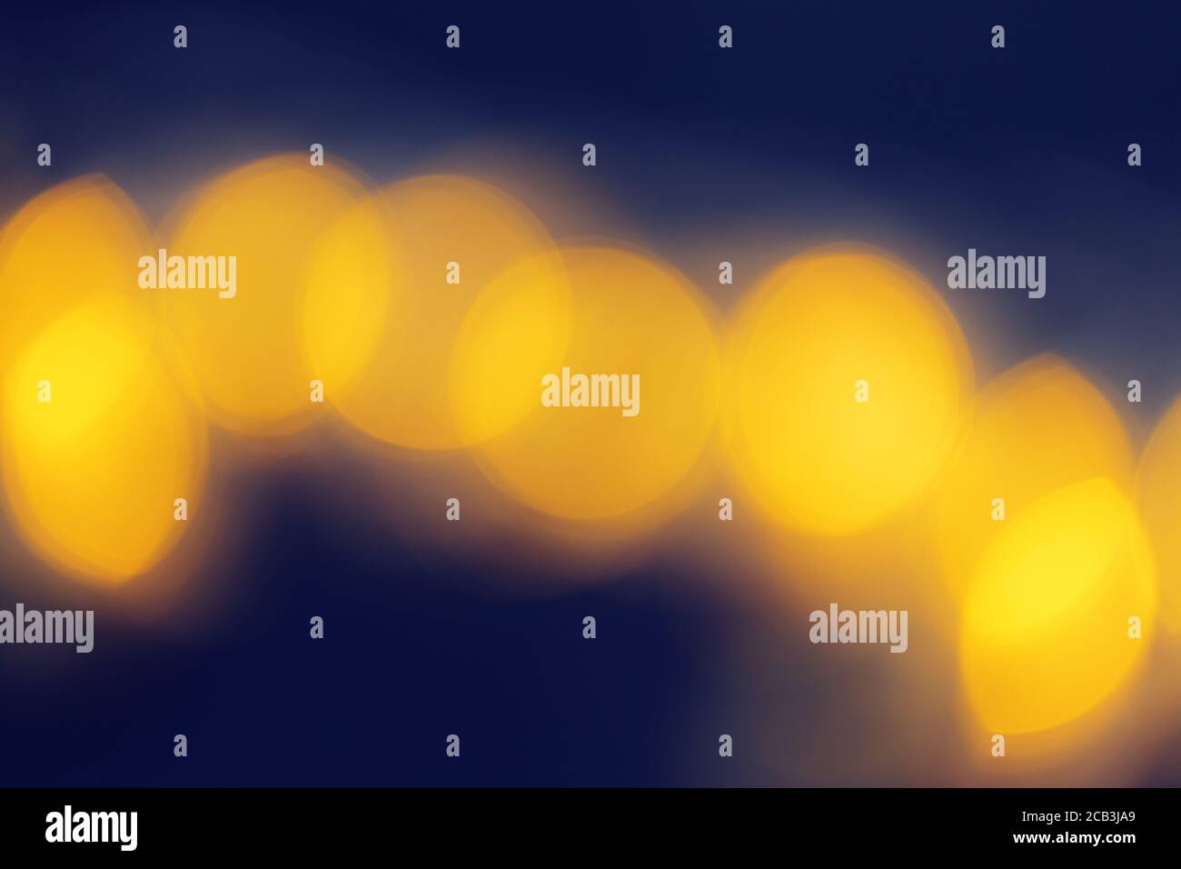 Gold shining lights in blur for background Stock Photo - Alamy