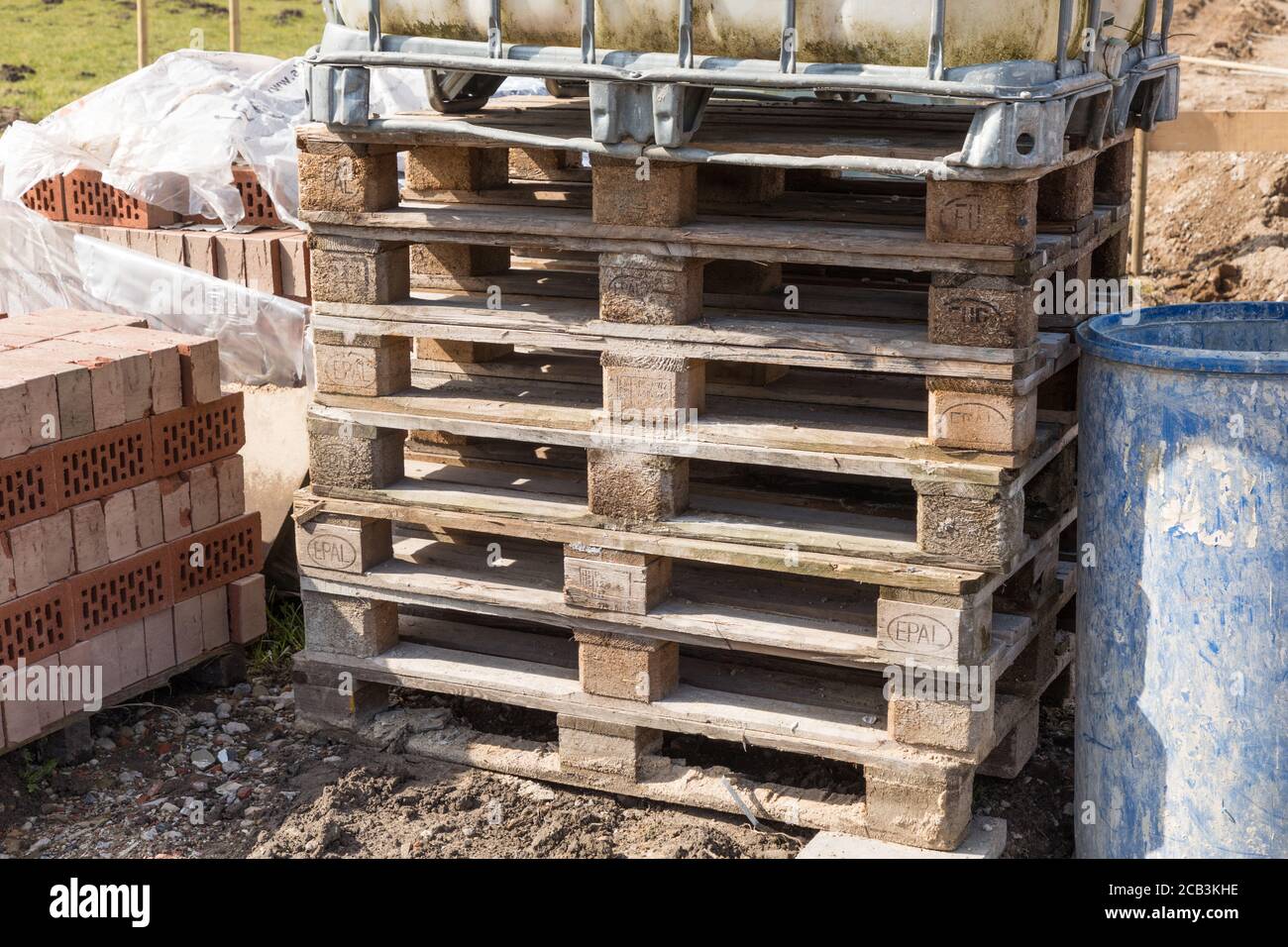 View of a used wooden pallets Stock Photo - Alamy