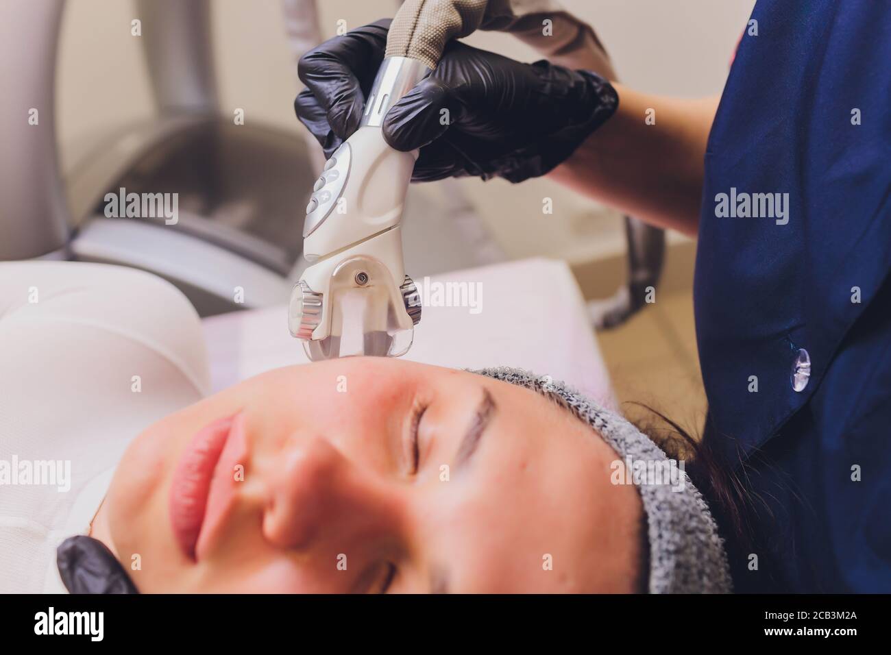 Lymphatic drainage massage LPG apparatus process. Therapist beautician ...