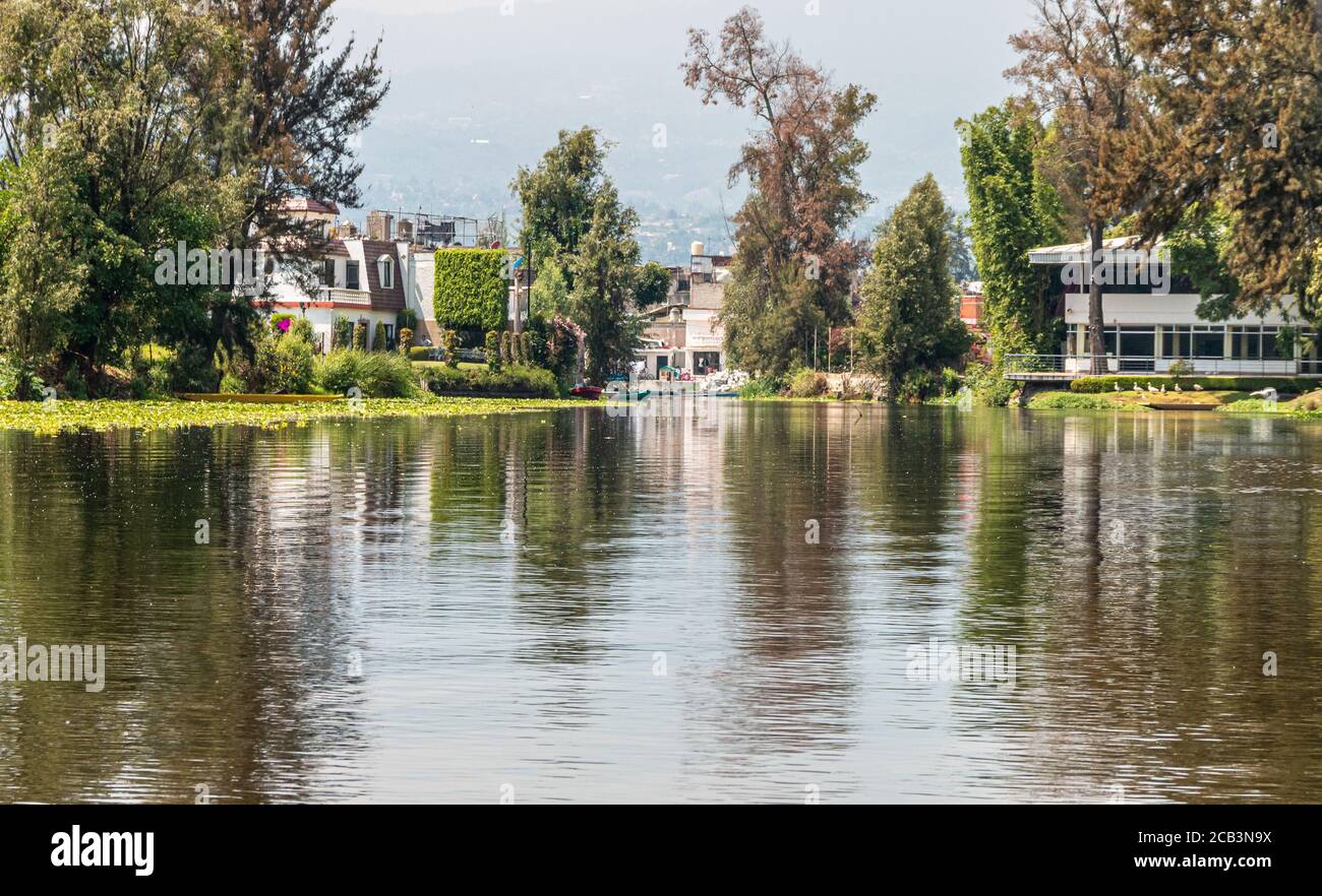 Landscape of the Cuemanco canal in Xochimilco, Mexico City. Calm river ...