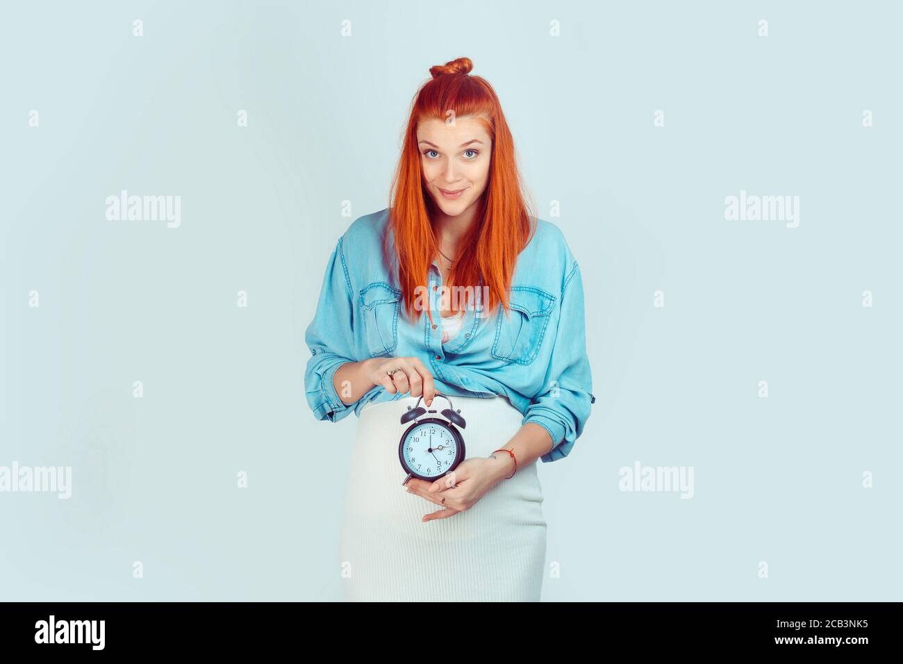 Baby, clock face hi-res stock photography and images - Alamy