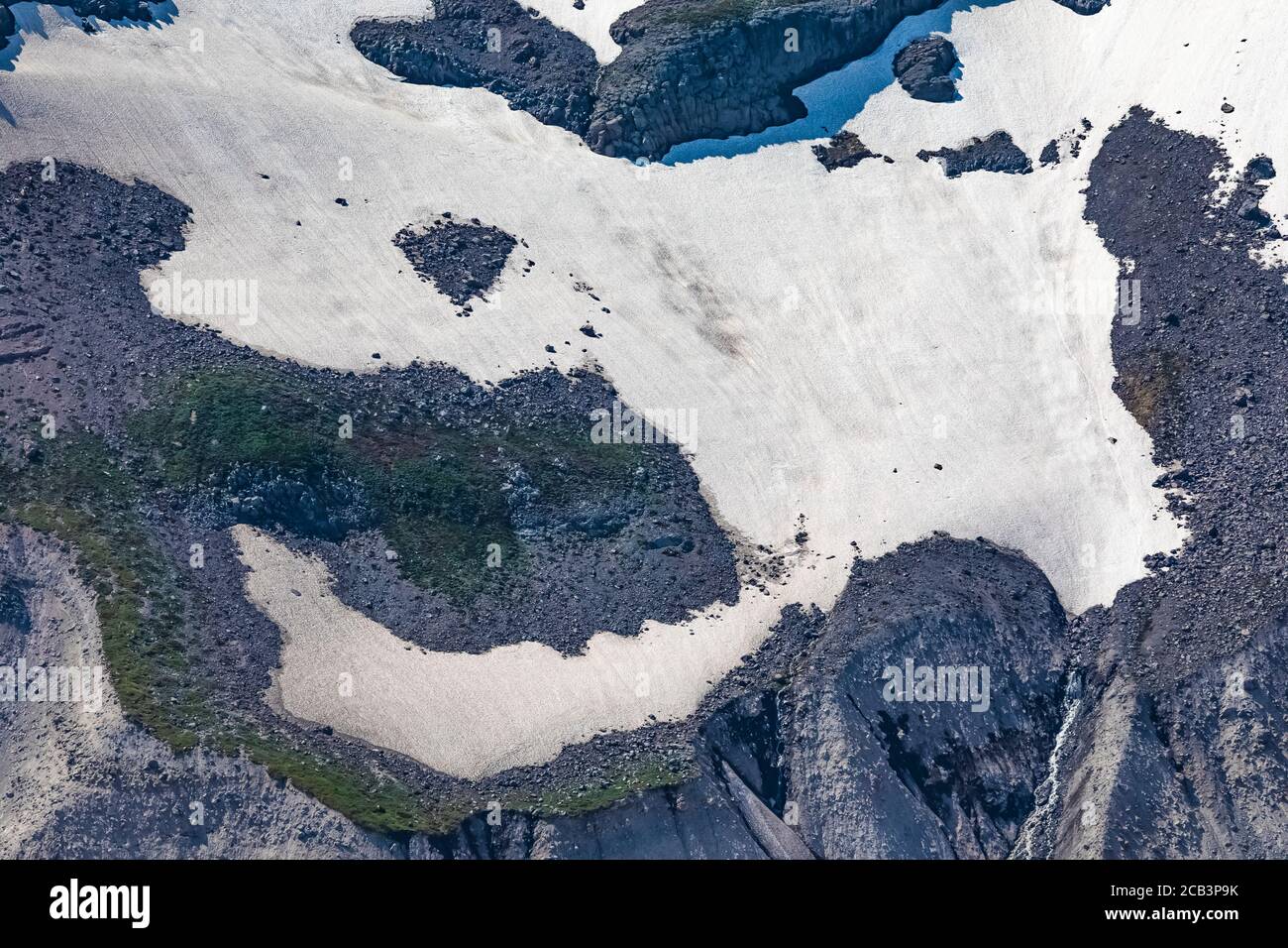 Snow field and talus slopes above Nisqually Glacier in July in Mount ...