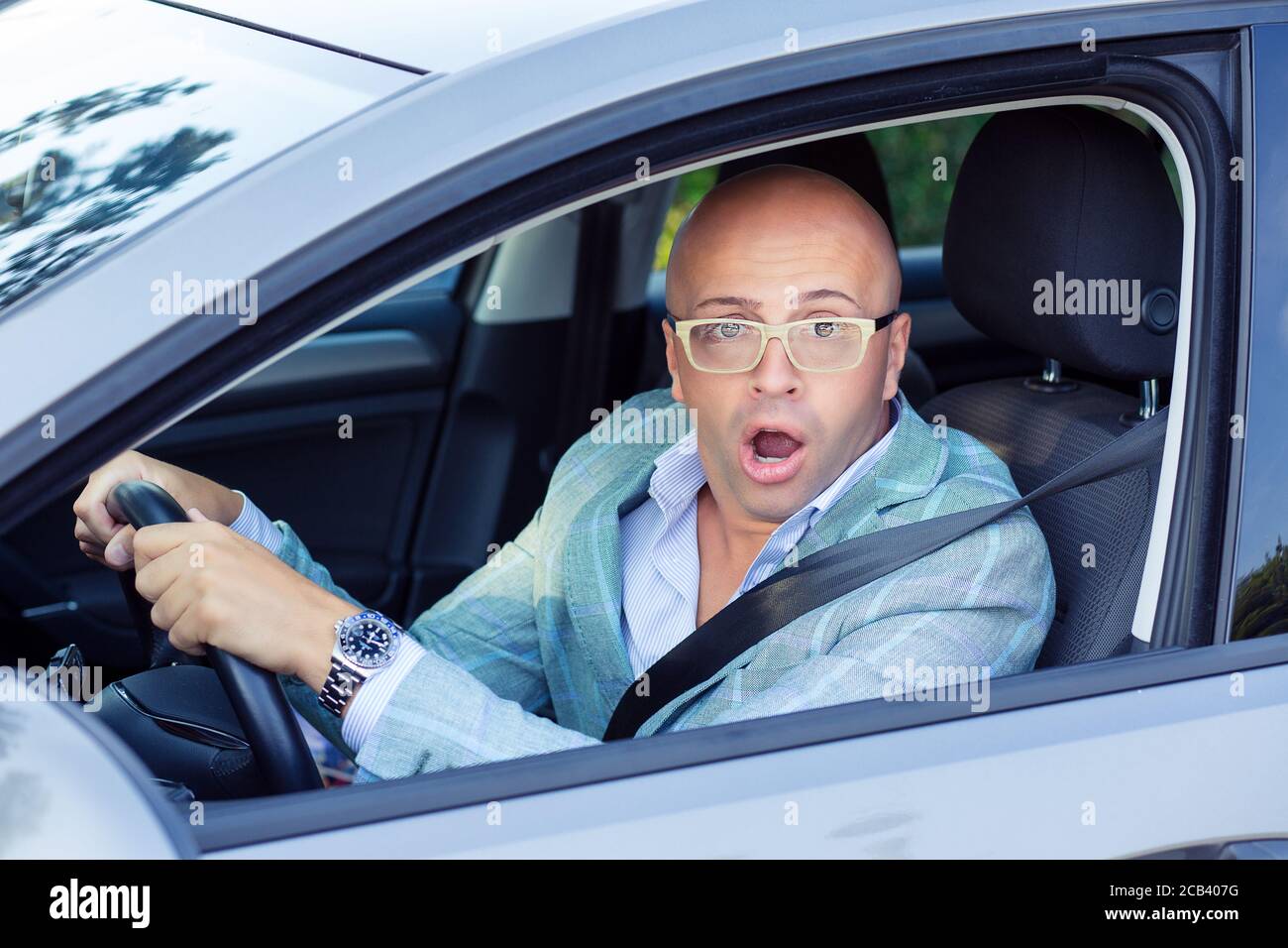 Bald driver hi-res stock photography and images - Alamy