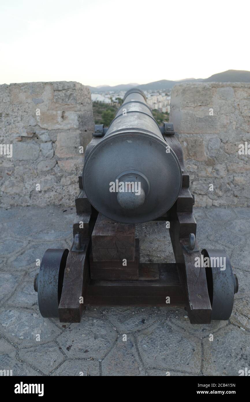 Vertical shot of a cannon in a fort Stock Photo - Alamy