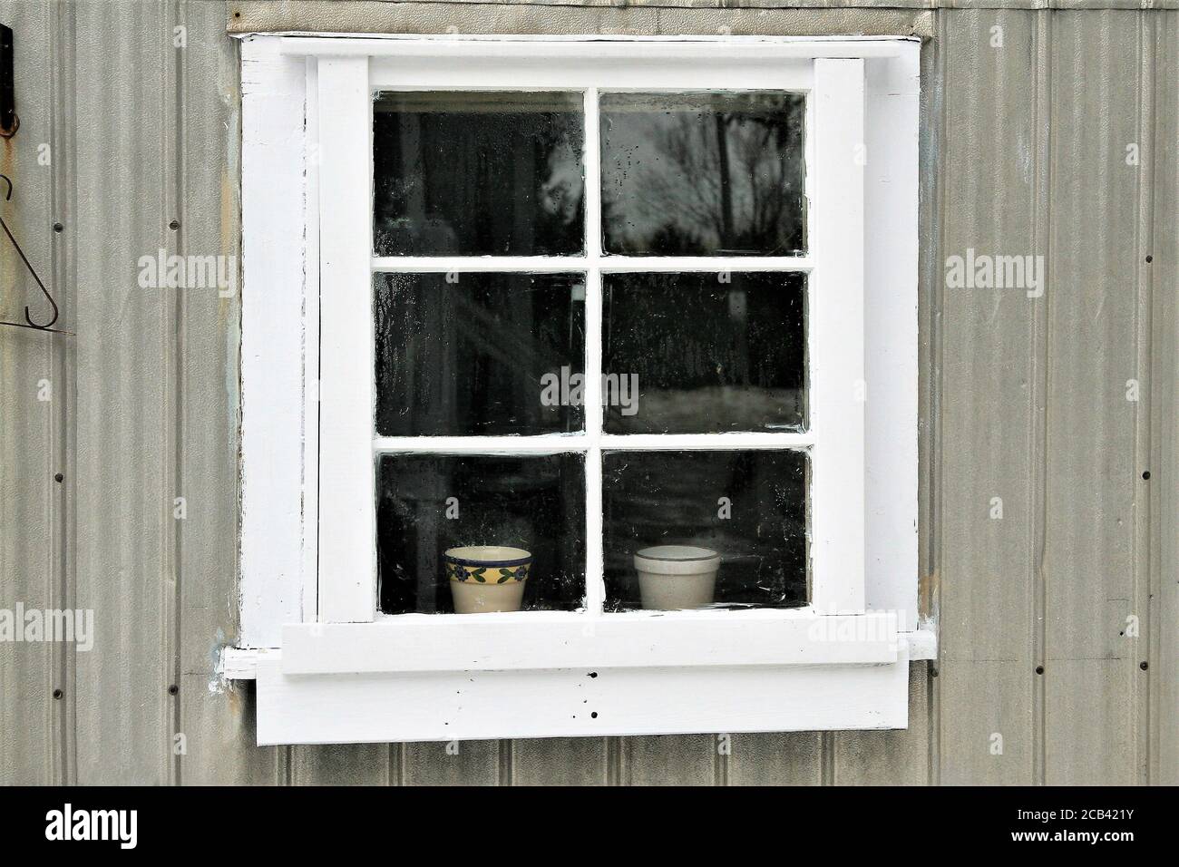 Old fashioned vintage white window with pots inside Stock Photo - Alamy