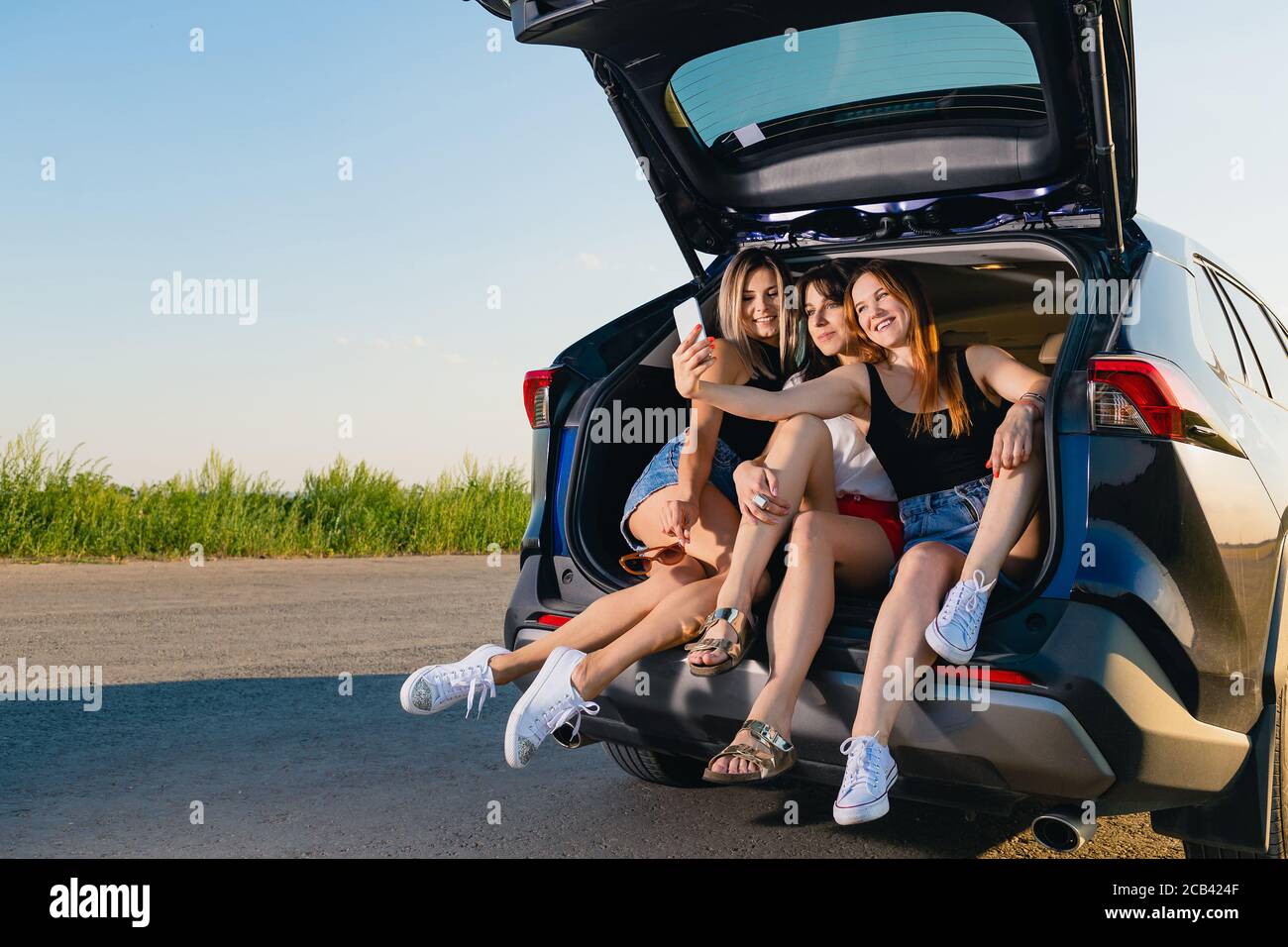 Three Girls Take A Selfie Together Blonde Brunette And Red Haired