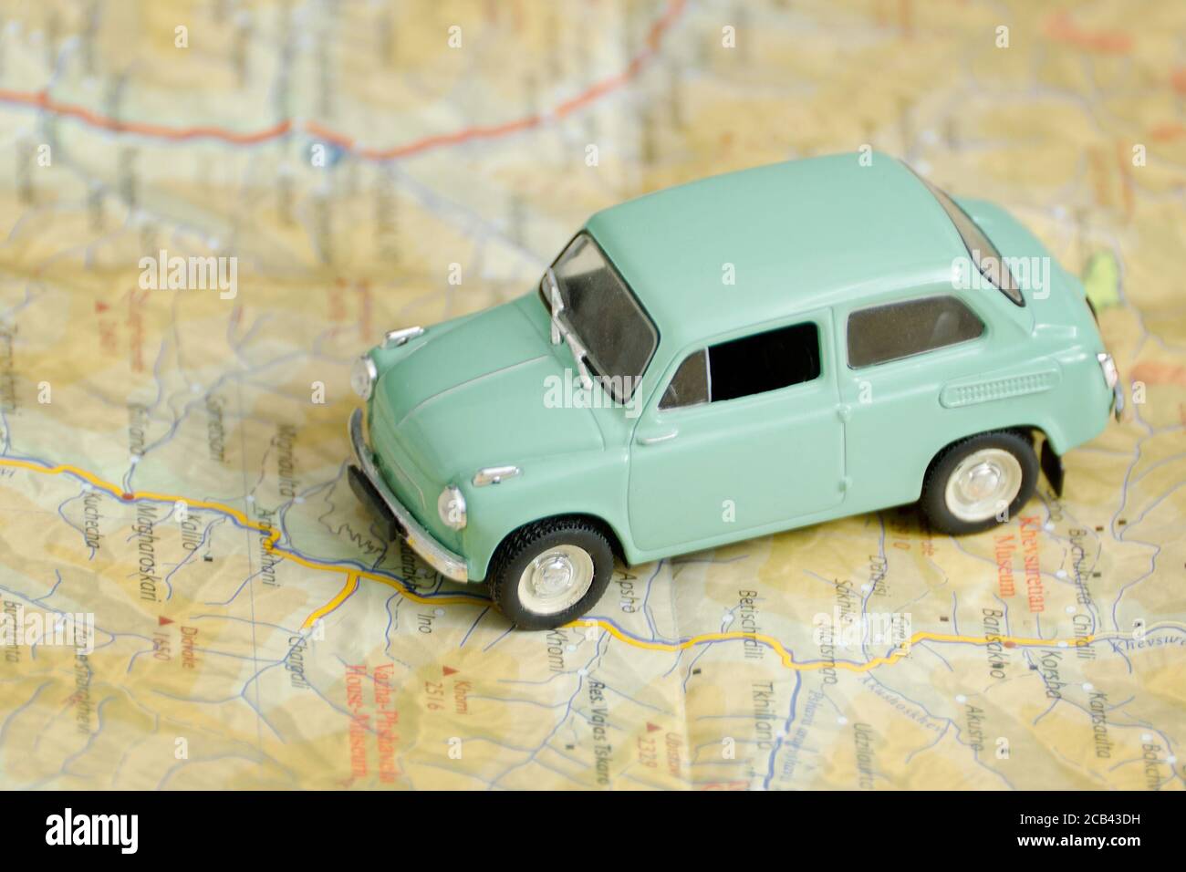 Car on the map. Travel concept. Close up Stock Photo - Alamy