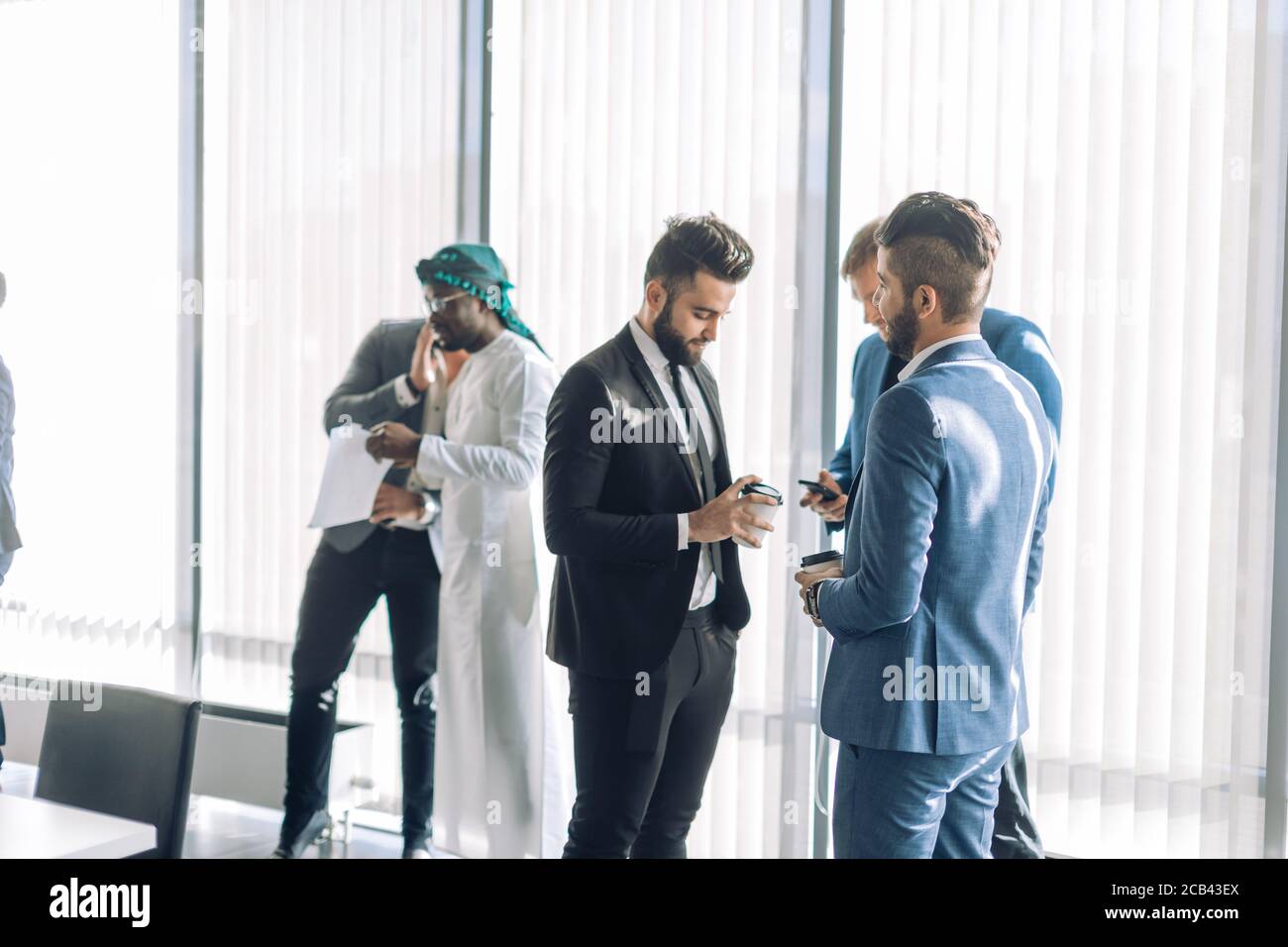 Workers socializing hi-res stock photography and images - Alamy