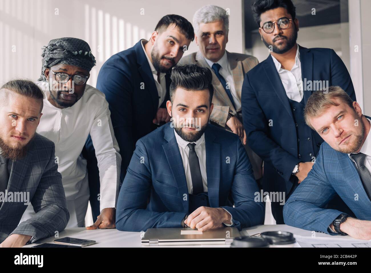 Multicultural business people including Arabic, Caucasian, Indian ...