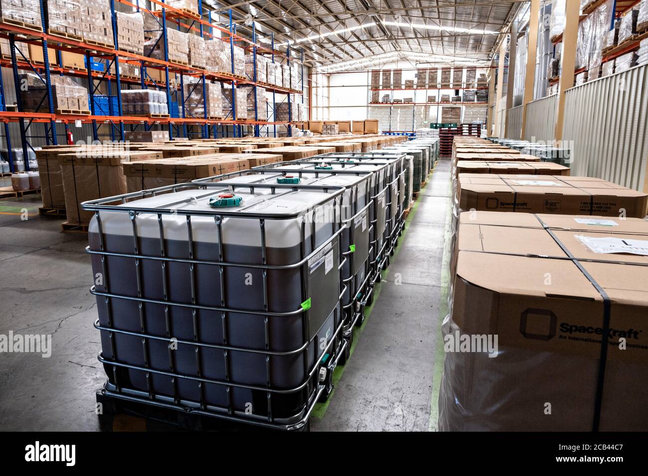 Giant vats containing with organic agave syrup ready for shipping in ...