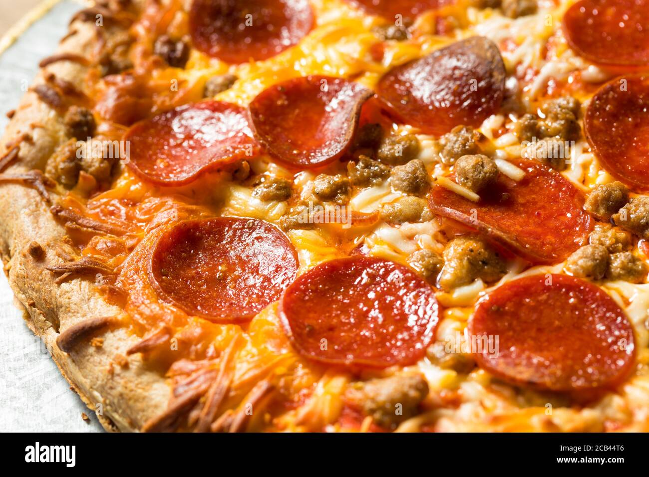 Homemade Meat Lovers Pepperoni Pizza with Sausage and Bacon Stock Photo ...