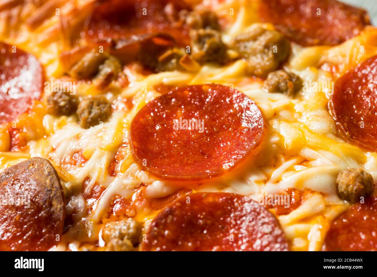 Homemade Meat Lovers Pepperoni Pizza with Sausage and Bacon Stock Photo ...