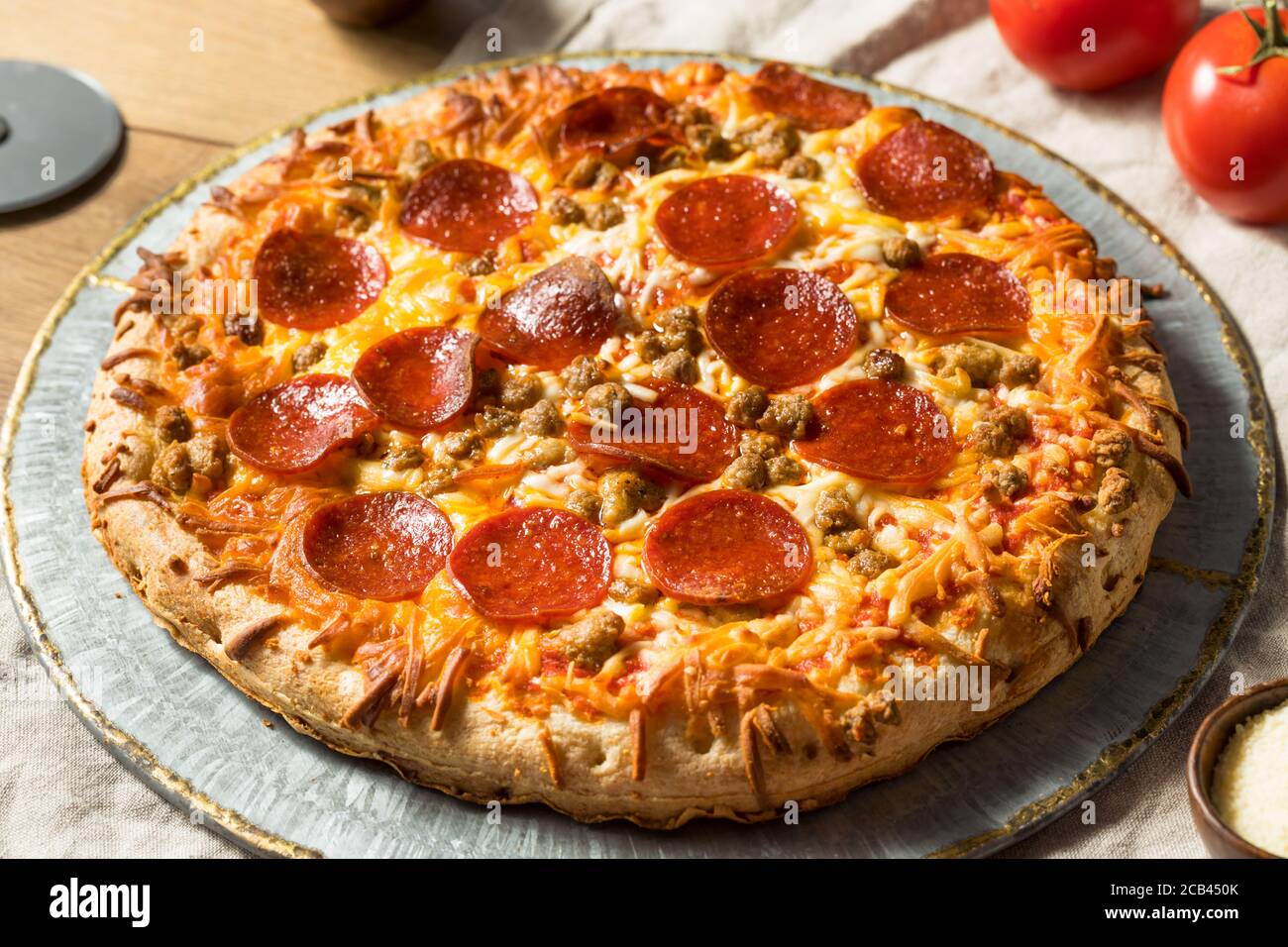 Homemade Meat Lovers Pepperoni Pizza with Sausage and Bacon Stock Photo ...