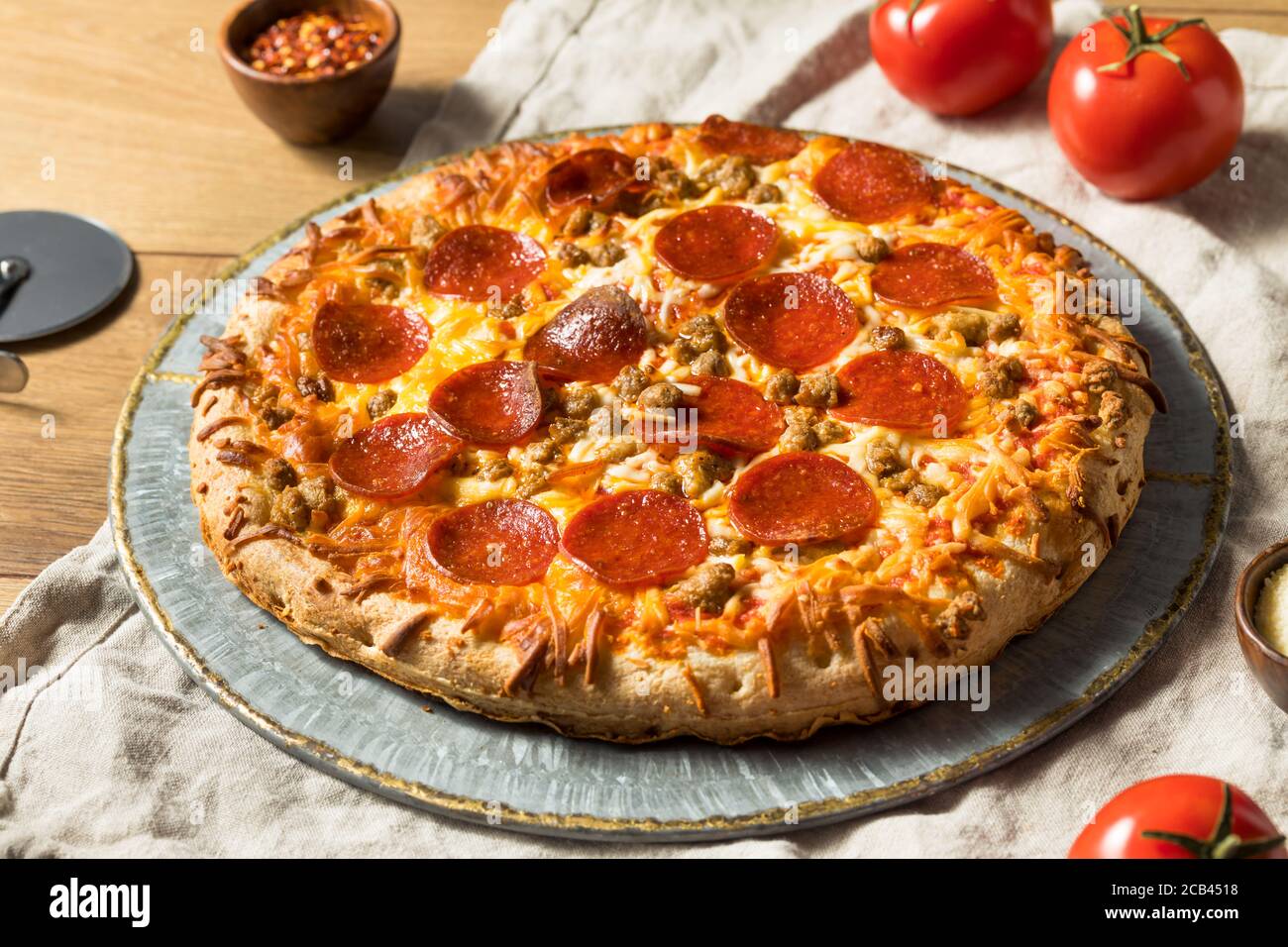 Homemade Meat Lovers Pepperoni Pizza with Sausage and Bacon Stock Photo ...