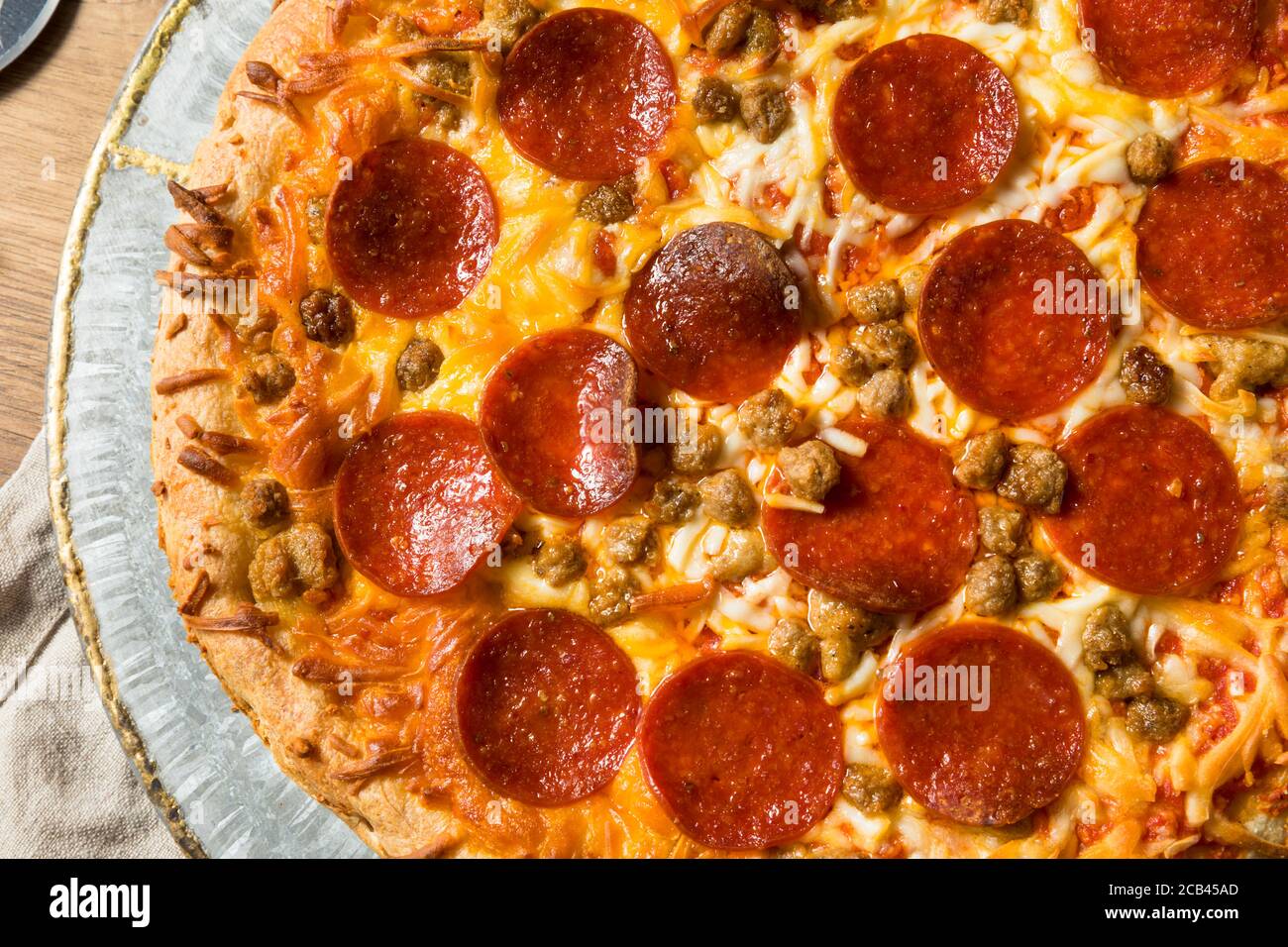 Homemade Meat Lovers Pepperoni Pizza with Sausage and Bacon Stock Photo ...