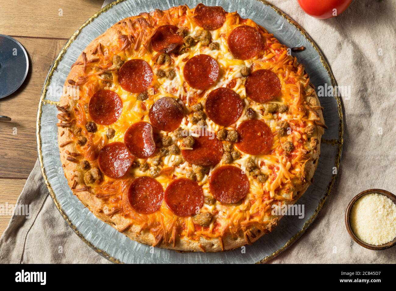 Homemade Meat Lovers Pepperoni Pizza with Sausage and Bacon Stock Photo ...