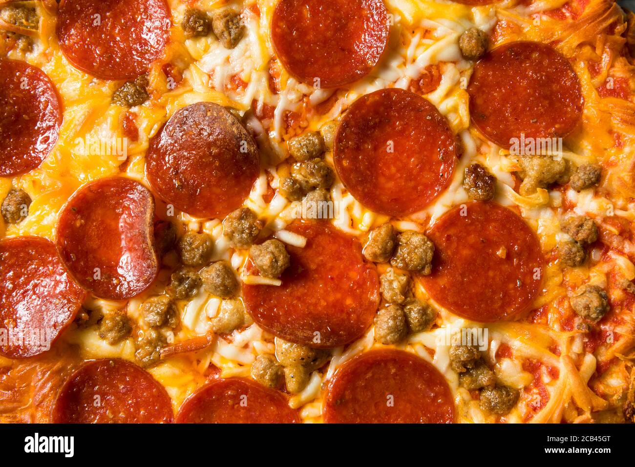 Homemade Meat Lovers Pepperoni Pizza with Sausage and Bacon Stock Photo ...