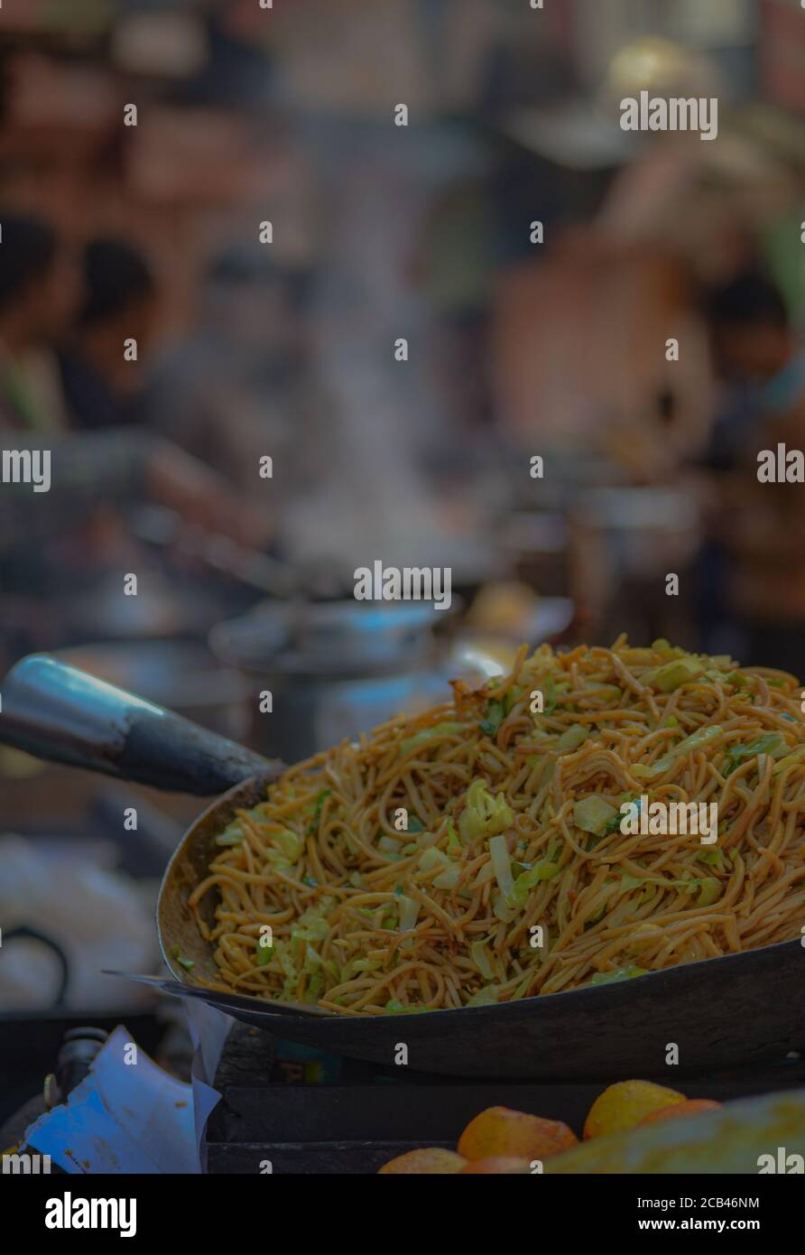 Chow Mein in a big iron pan in Assam, Northern India Stock Photo - Alamy