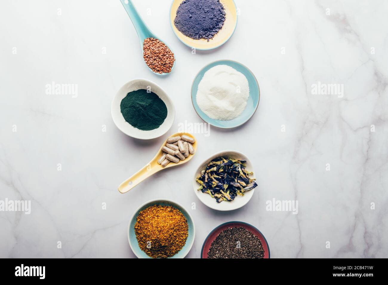 Variety of healthy food supplements Stock Photo - Alamy