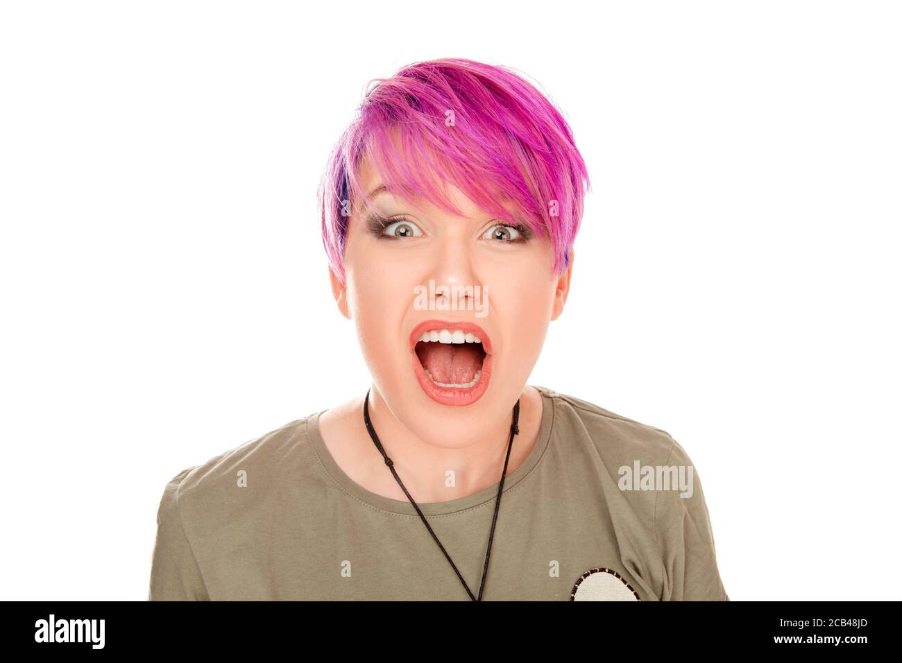 Angry young woman shocked screaming isolated on white background ...