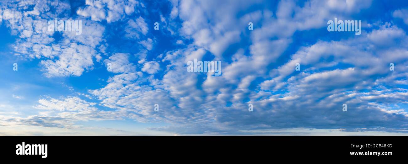 A beautiful day panorama with Cirrus cumulus and Stratocumulus clouds ...