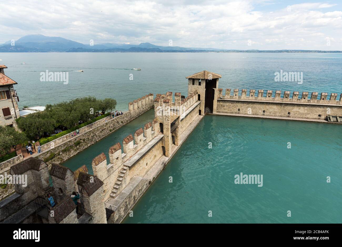 Backwater inside the Scaliger Castle - medieval port fortress, Sirmione ...