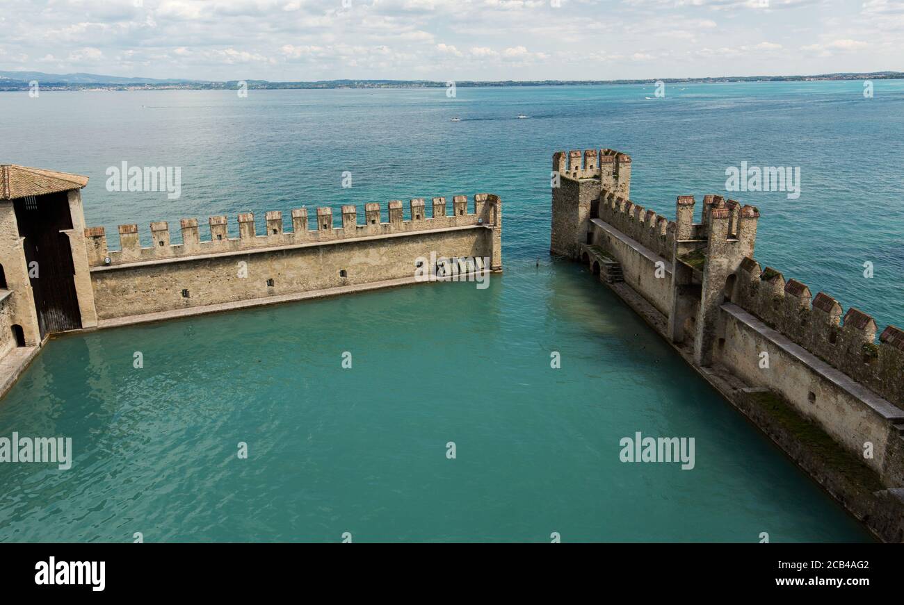 Backwater inside the Scaliger Castle - medieval port fortress, Sirmione ...
