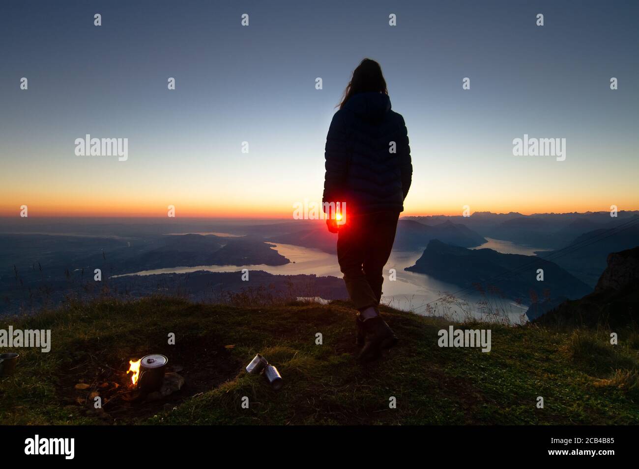 A person standing in front of an abyss Stock Photo - Alamy