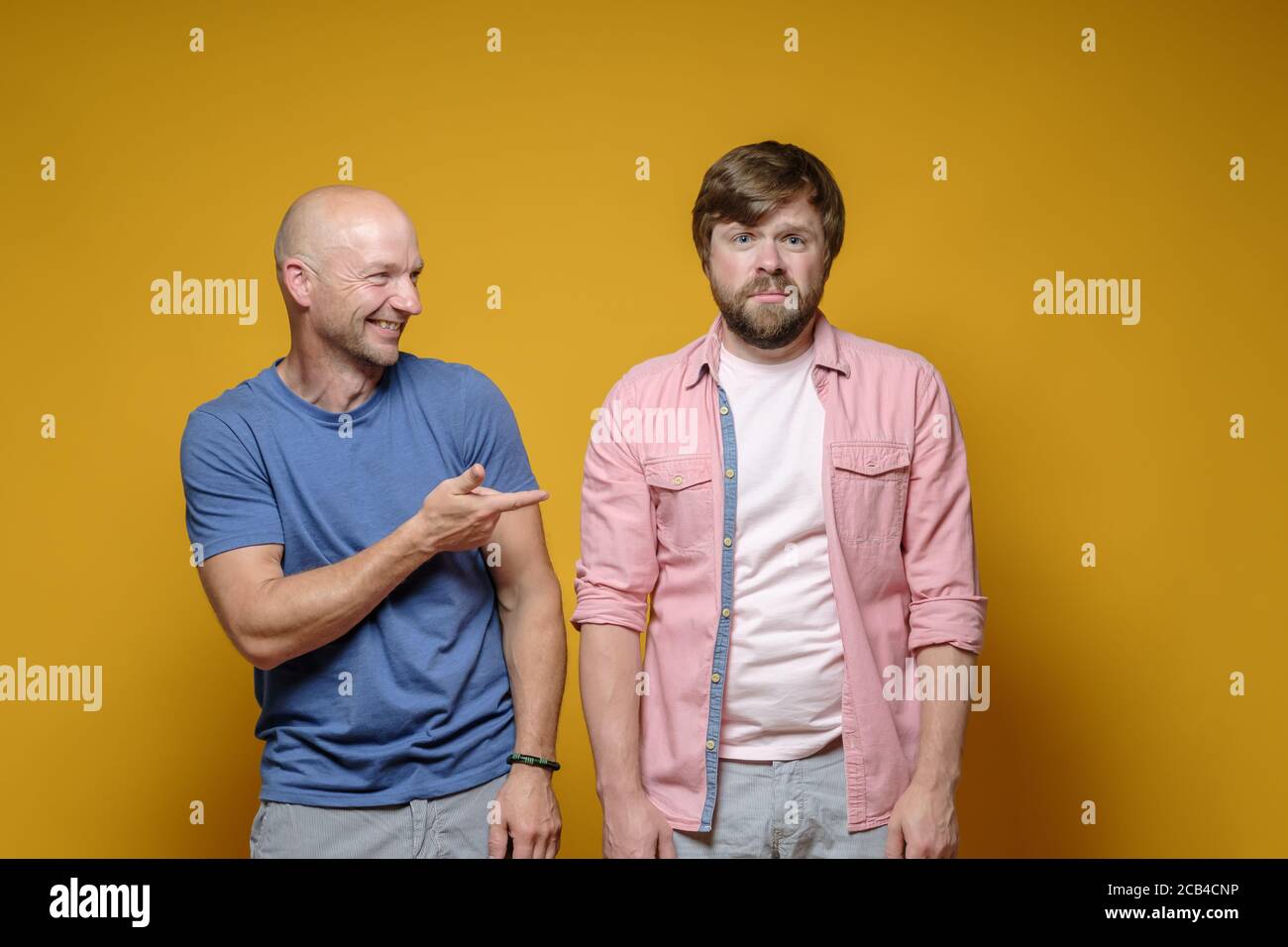 Laughing at friend upset hi-res stock photography and images - Alamy