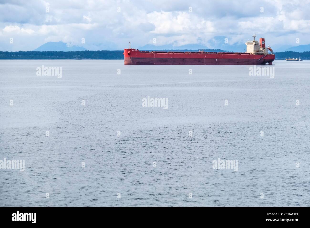 A Red Ocean Container Ship Vessel Anchored in Elliot Bay Outside ...