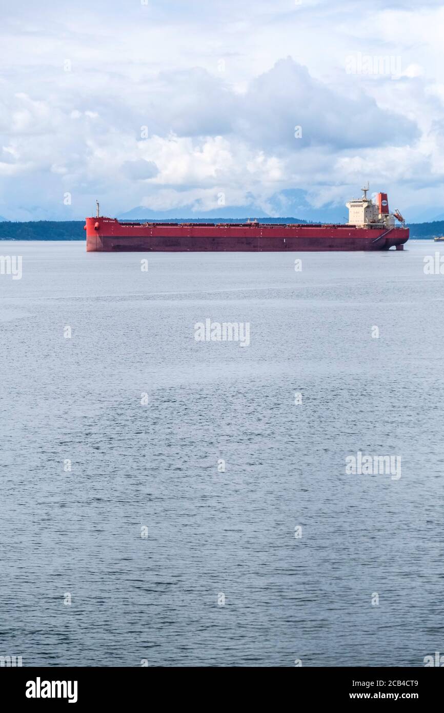 A Red Ocean Container Ship Vessel Anchored in Elliot Bay Outside ...