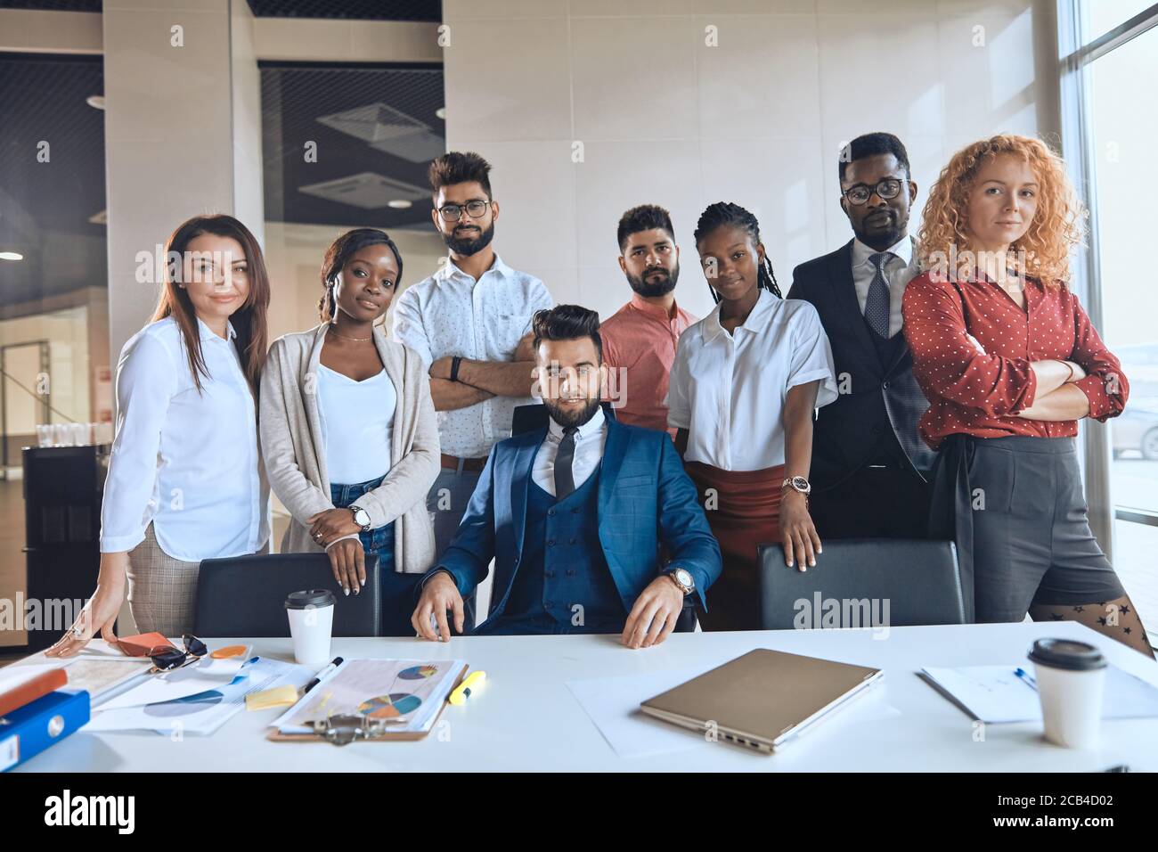 strong inspired and motivated team of young people working together ...