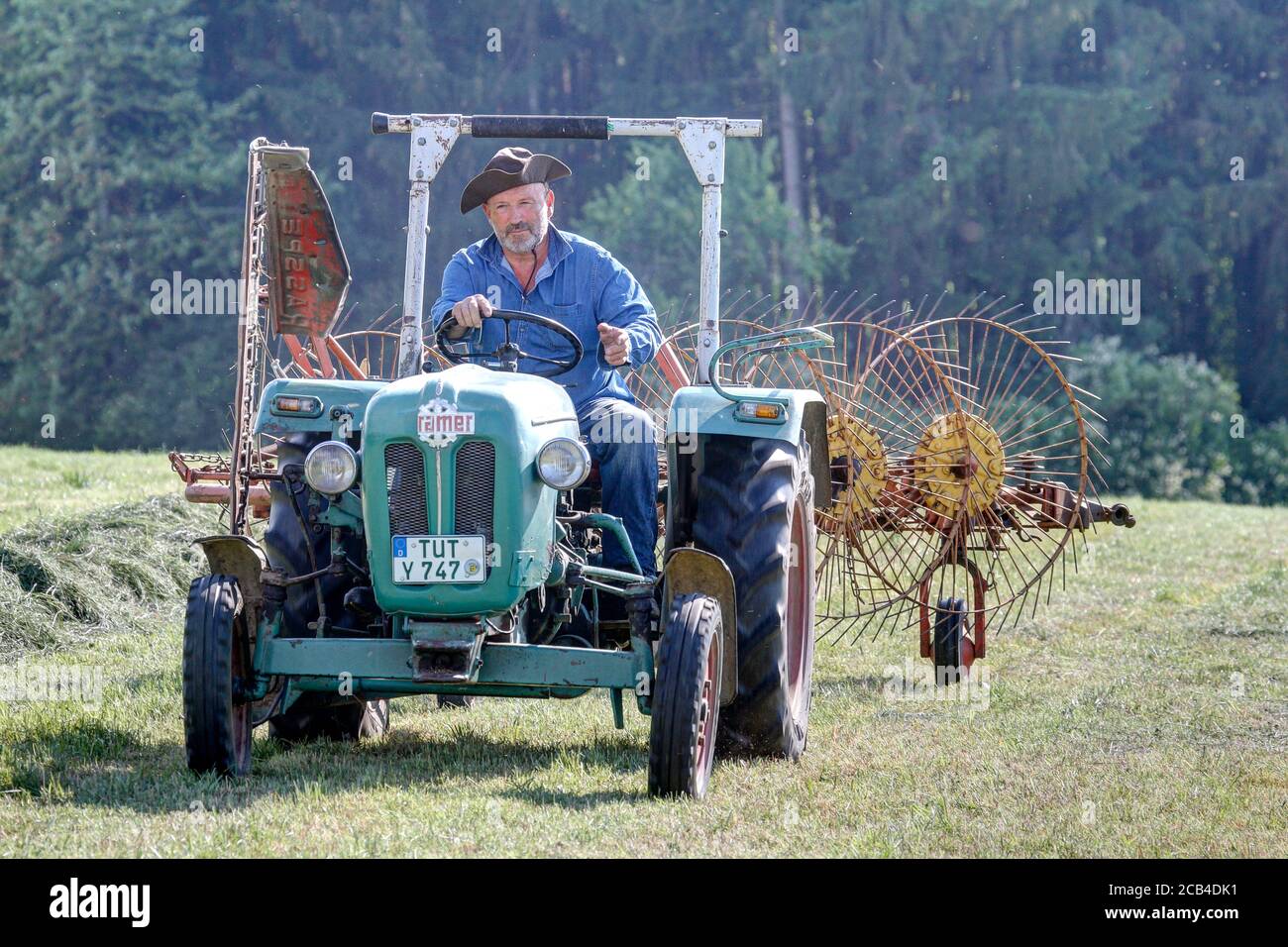 Trossingen, Germany, 06/24/2020. Ecological farmer drives off the hay ...