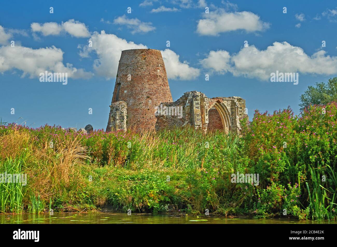 Remains of St Benet's Abbey and windmill on the banks of the River Bure ...