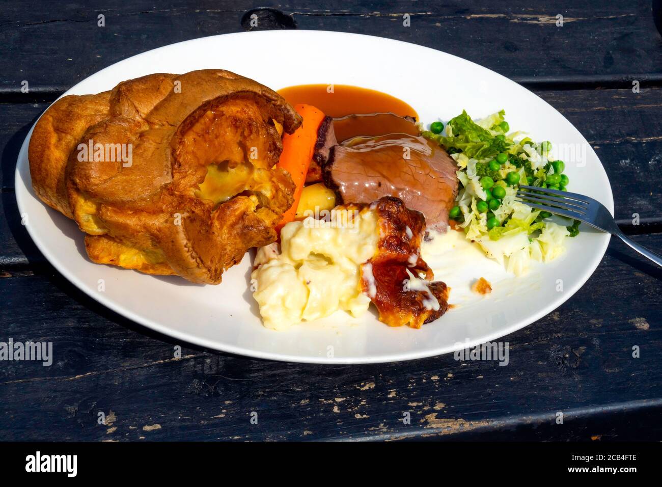Sunday Lunch main course Roast Beef a large Yorkshire pudding ...
