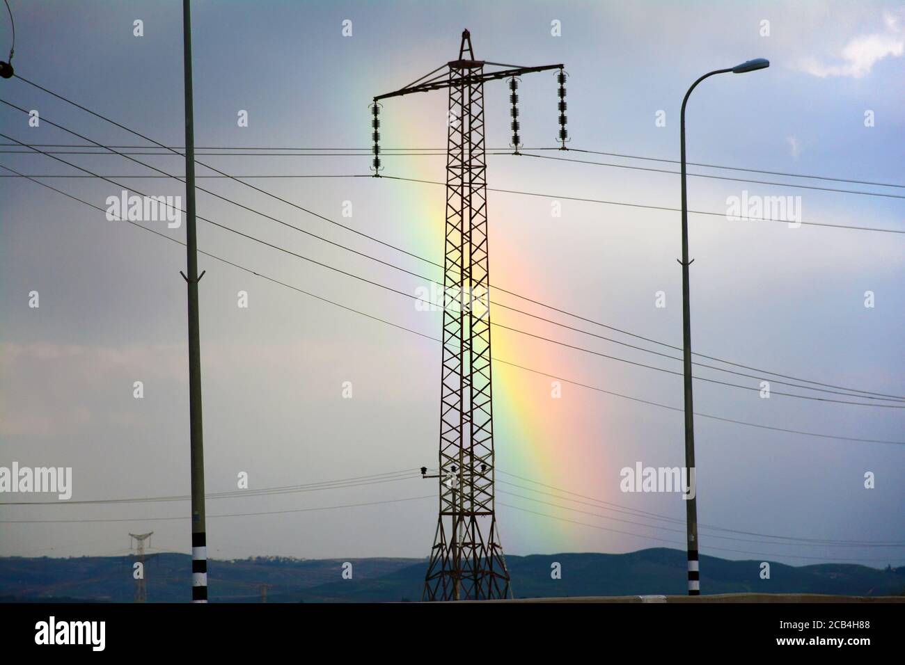 Electricity And rainbow Stock Photo - Alamy