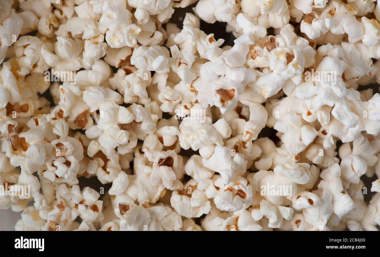 Scattered simple popcorn, texture background Stock Photo - Alamy