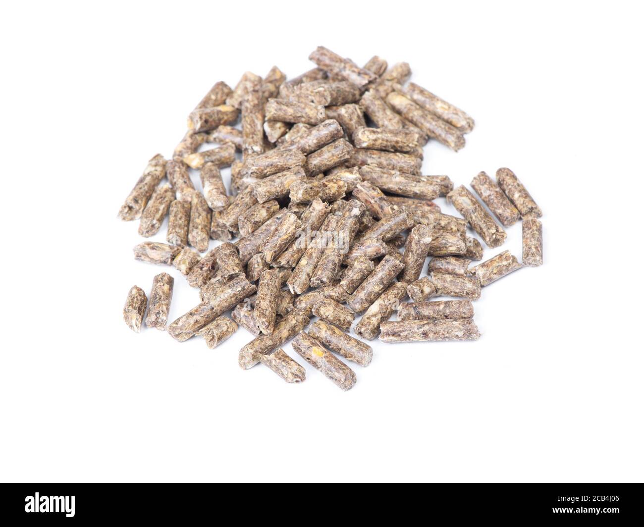 Pile of dry grass pellets for rodents isolated on white background ...